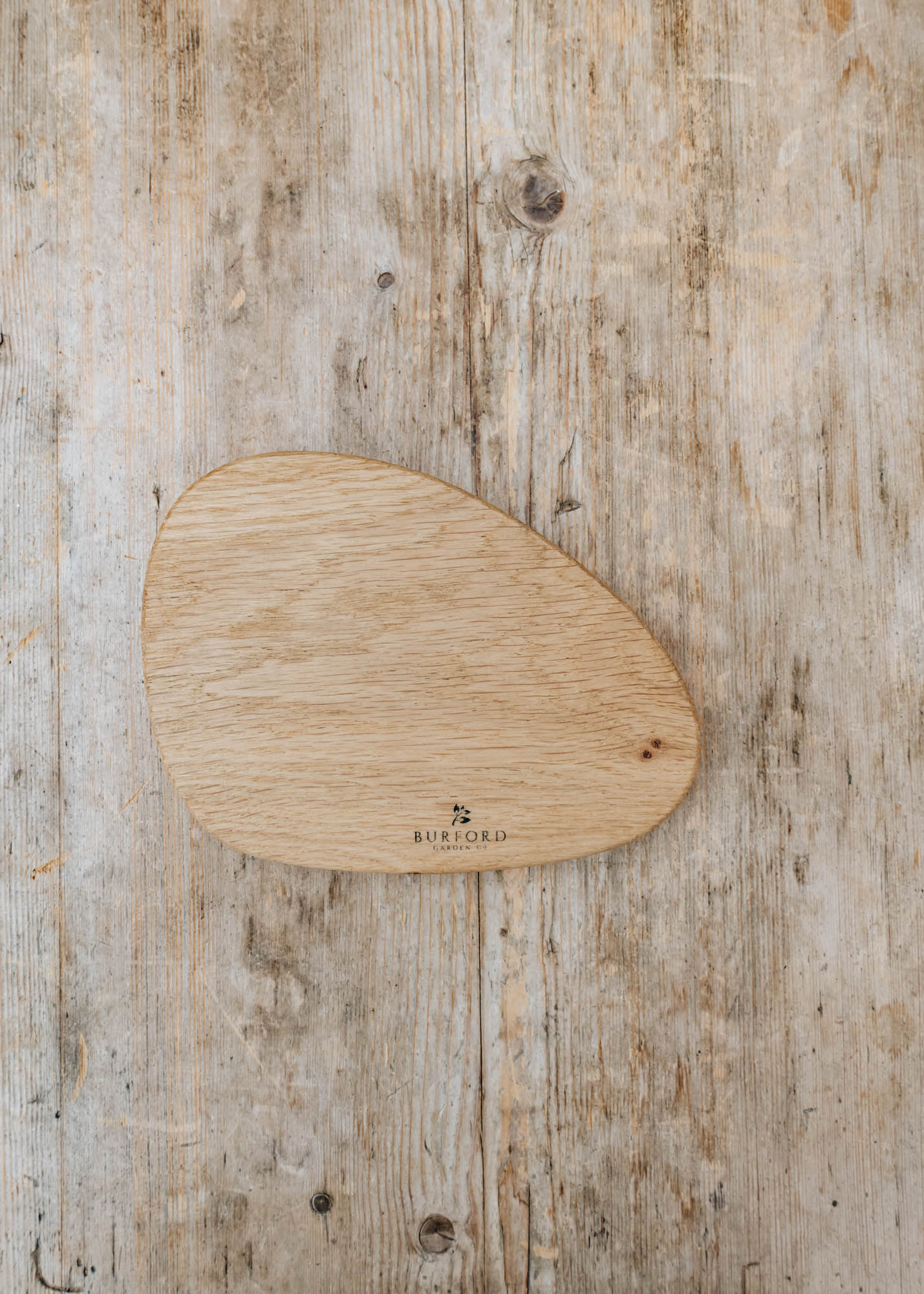 STIK Designs Small Pebble Shaped Oak Chopping Board | Burford Garden Co.